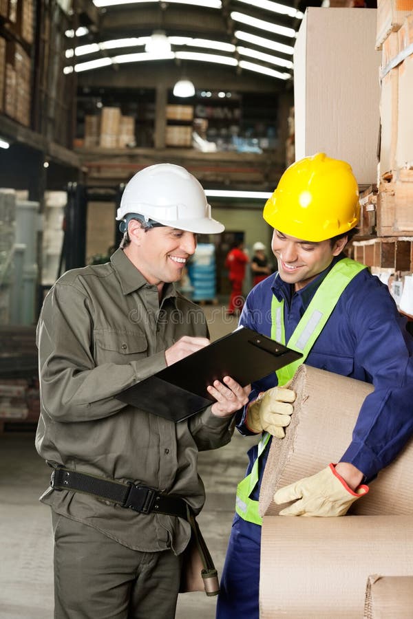 Supervisor Showing Clipboard To Foreman Stock Image - Image of forklift ...