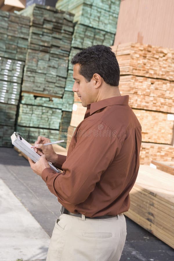 Supervisor Stock Taking in Warehouse Stock Photo - Image of baby, latin ...