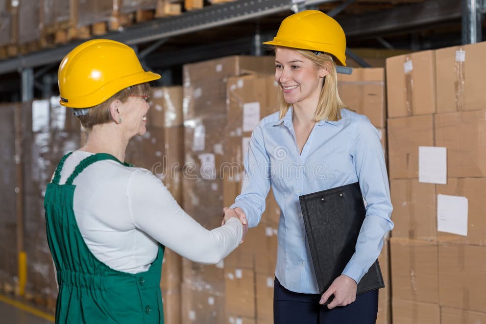 Supervisor and Storage Worker Stock Photo - Image of industry, helmet ...