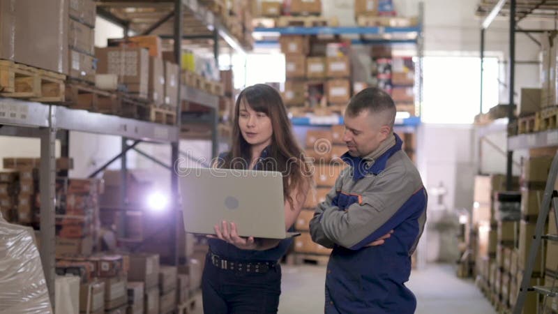 Female Employee of Distribution Center for Cargo Delivery Checks Good ...