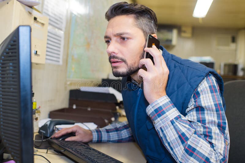 Supervisor Using Cell Phone and Pc at Warehouse Stock Image - Image of ...