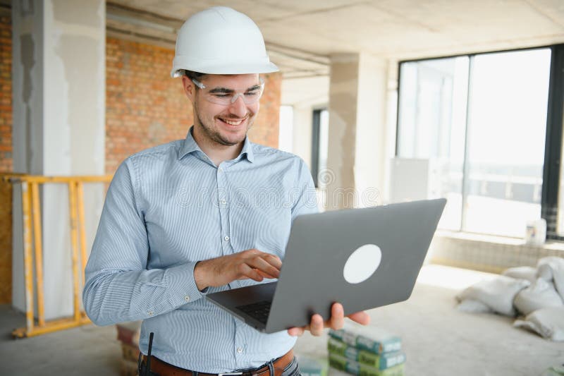 Supervisor Using Laptop at Construction Site Stock Photo - Image of ...