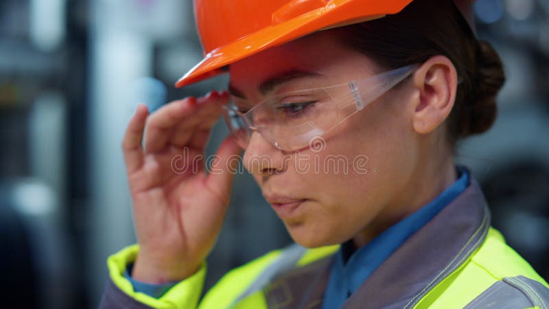 Supervisor Working Project on Modern Factory Closeup. Business Analyst ...