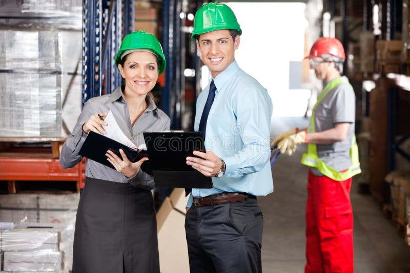 Manager in Warehouse Checking Boxes Using Digital Tablet Stock Image ...