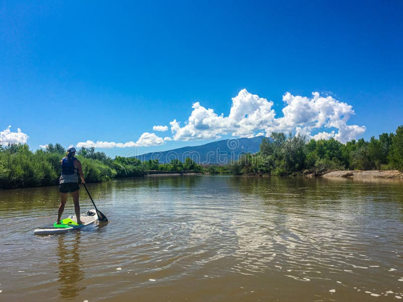 SUPing down the Rio Grande editorial photo. Image of float - 152509941