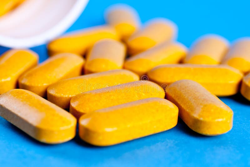 Supplements in pill form stock image. Image of yellow - 13360583