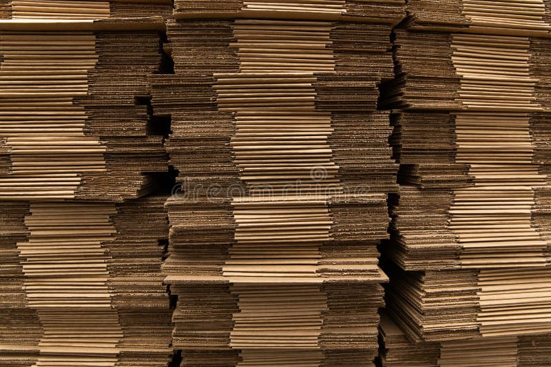 Supply of Unassembled Cardboard Boxes in the Warehouse. Stack of ...