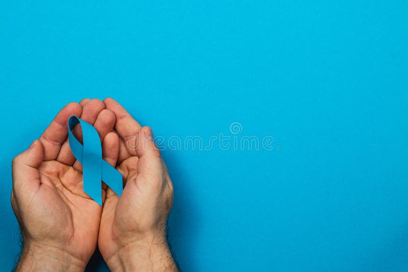 Support for Cancer Awareness through Symbolism of Blue Ribbon in Hands ...