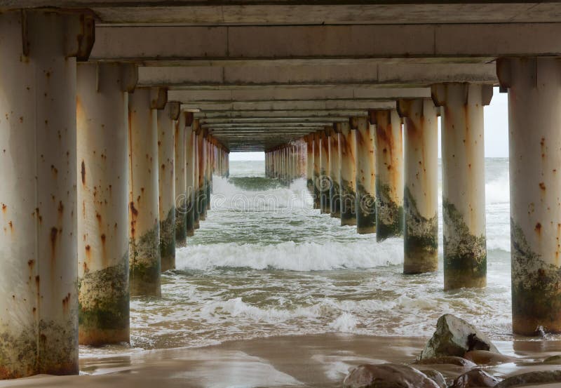 The Support of the Sea Promenade, Under the Bridge, the Sea Water Under ...
