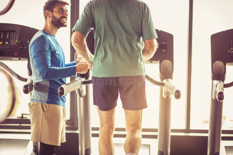 Support. Senior Man at Gym. Stock Image - Image of exercising, center ...