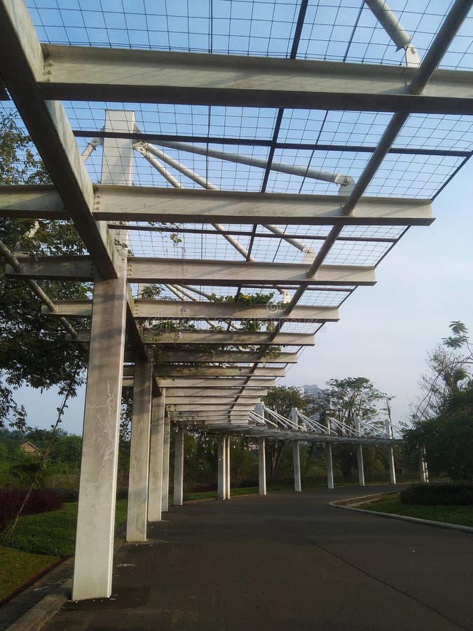 Supporting Poles Neatly Lined Up on the Side of the Road Stock Image ...