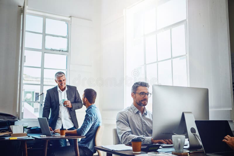 Supporting the Teams Dream with Hard Work and Dedication. Mature ...