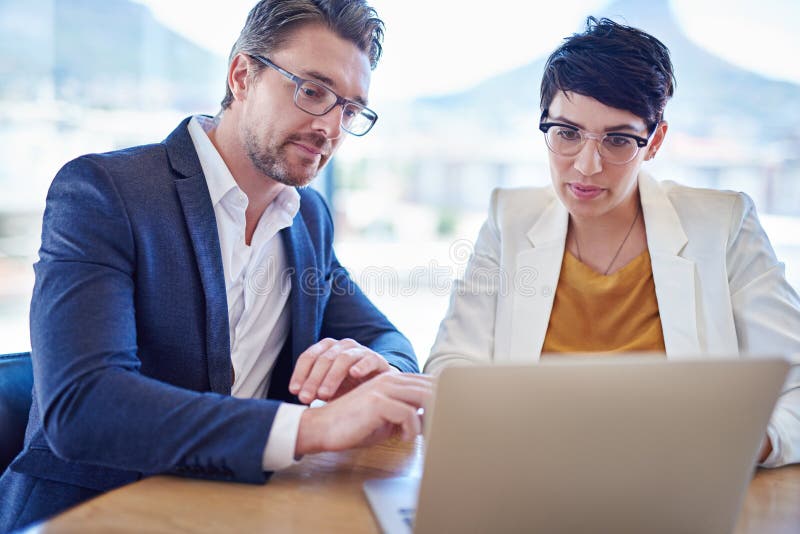 Supporting Their Business Developments with Technology. Two Colleagues ...