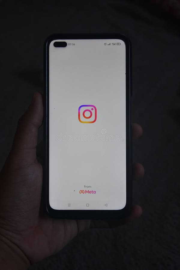 Surabaya, Indonesia. 08-28-2023: a Smartphone Held in the Hand, with ...