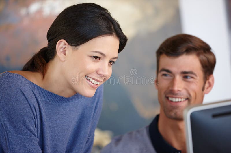 She Sure Knows Her Way Around Technology. a Young Couple Using a ...