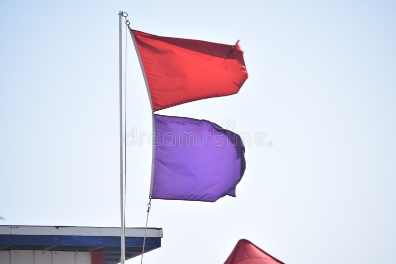 Surf Advisory stock image. Image of riptide, flags, warning - 68435335