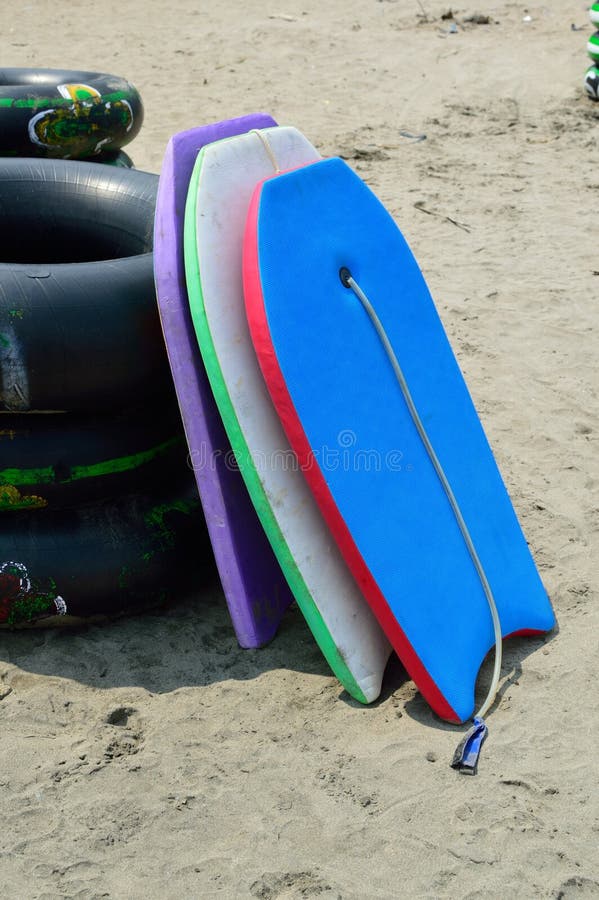 Surf boards on the beach stock photo. Image of boards - 278432528