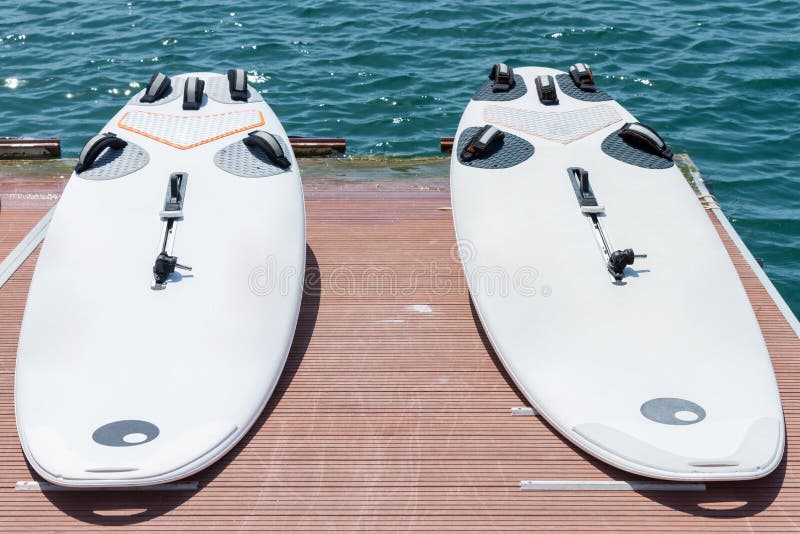 Surf Boards Stacked To Dry on the Dock Stock Photo - Image of dock ...