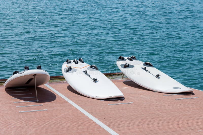 Surf Boards Stacked To Dry on the Dock Stock Photo - Image of holiday ...