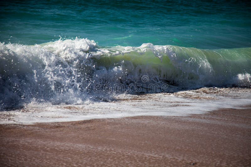 Surf Breaking on the Sandy Beach. Stock Image - Image of bukha ...