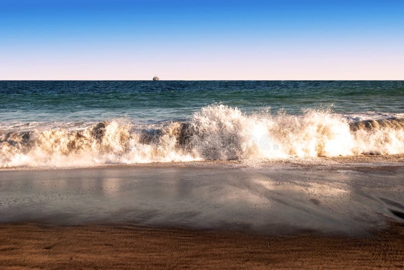 Surf breaks on the beach stock photo. Image of coastline - 160323644