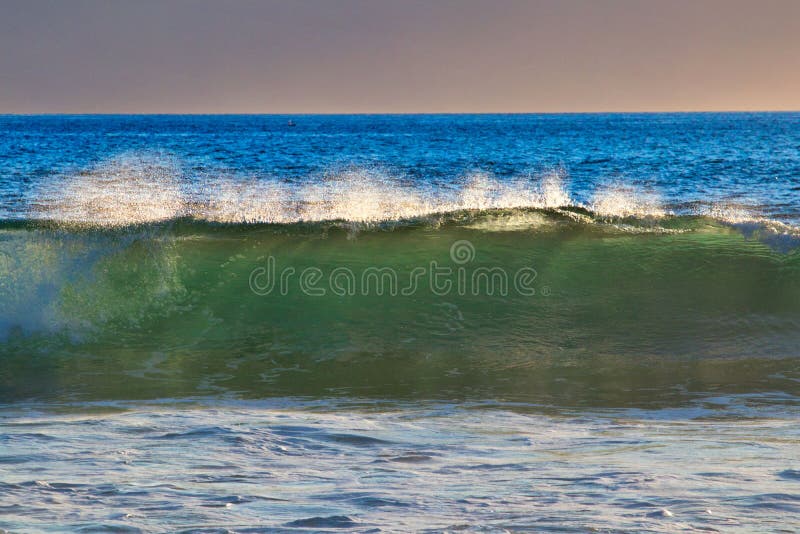 Surf at Breakwall in Lahaina at Sunset. Stock Photo - Image of hypnotic ...