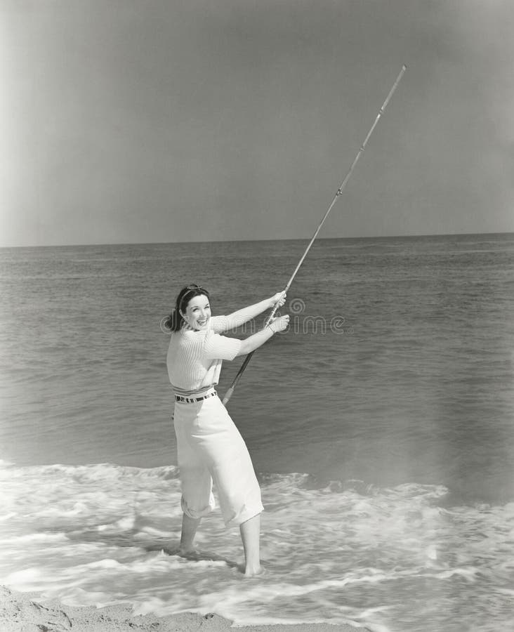 Surf fishing stock photo. Image of camera, 150806, female - 58628326