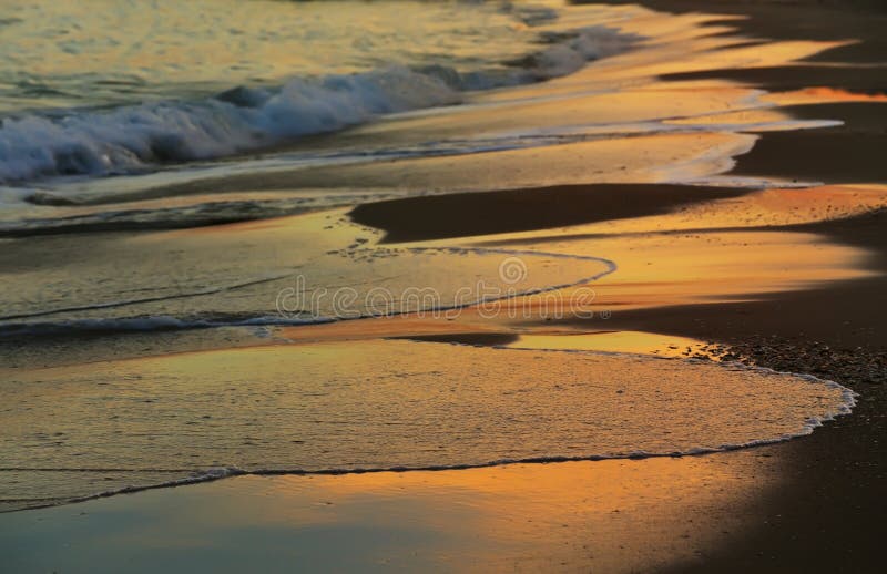 Surf line at sunset stock image. Image of nature, reflection - 82771909