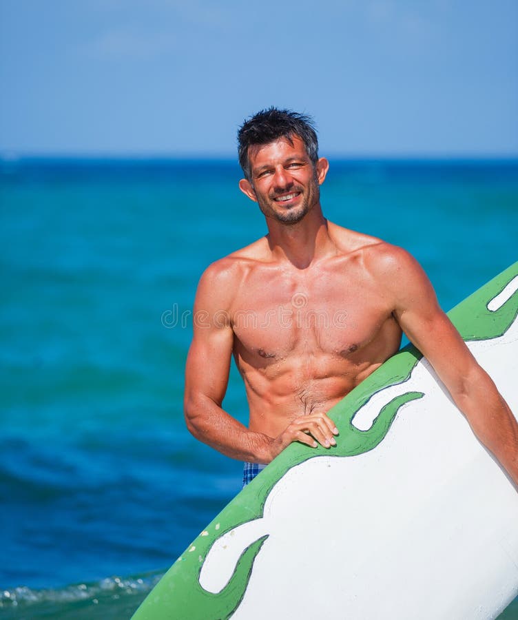 Surf man stock image. Image of male, blue, looking, modern - 55789231