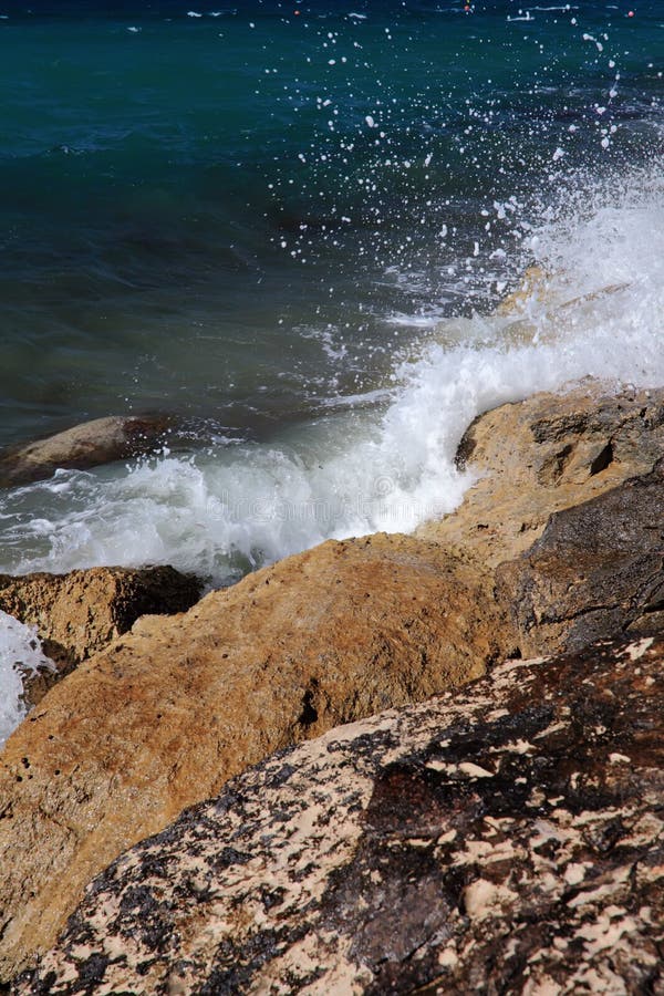 Surf and rocks. stock photo. Image of summer, blue, storm - 16859274