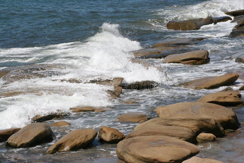 Surf and Rocks stock photo. Image of swim, coast, pound - 377120