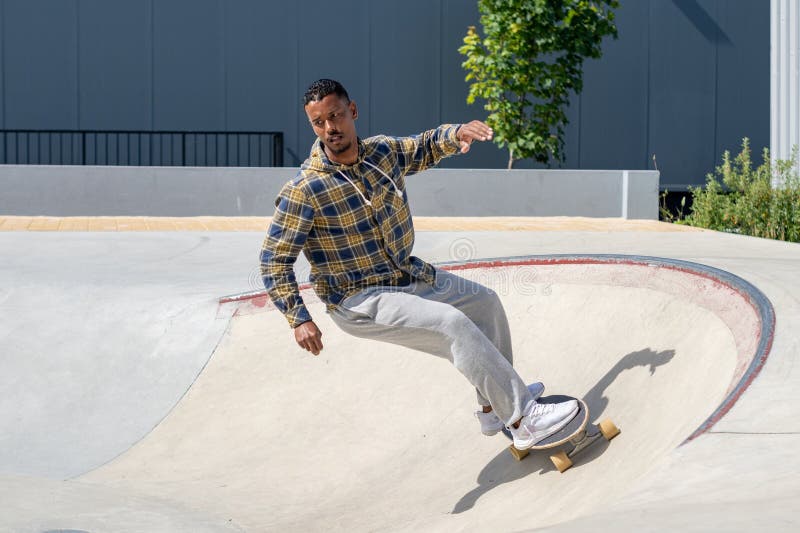 Surf Skater Performing a Turn on a Skatepark Stock Image - Image of ...