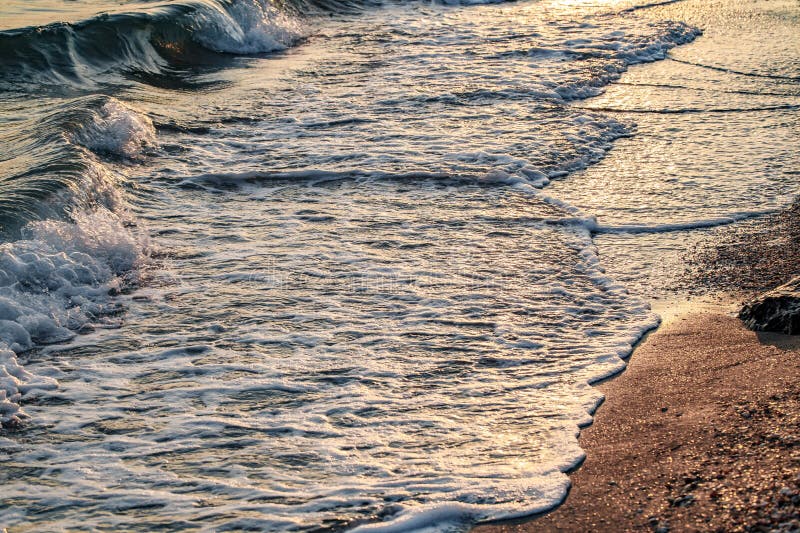 Surf Waves on Coast in Close-up at Sunset Stock Image - Image of ...