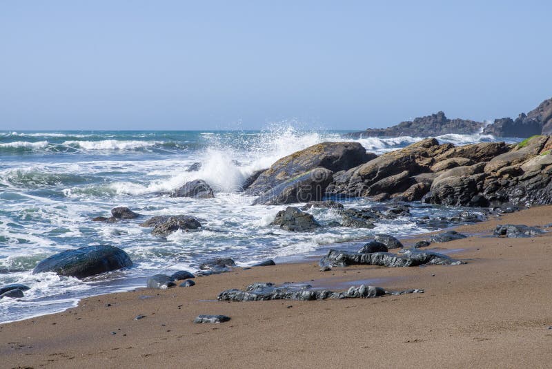Surf and Waves on a Rocky Coast Stock Photo - Image of shoreline, urban ...