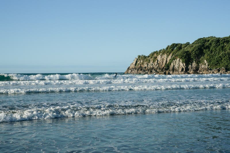 Surf Waves Roll in Onto Main Beach, Mount Maunganui by Moturiki Island ...