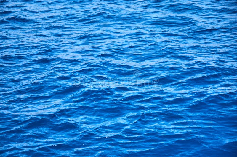 Surface of the azure water stock photo. Image of bright - 155496726