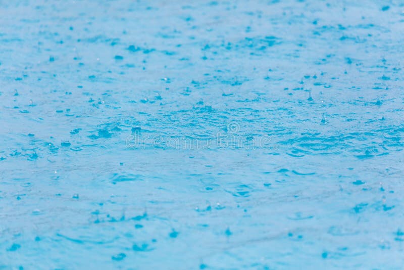 Surface of Blue Water in Heavy Rain. Stock Photo - Image of water ...