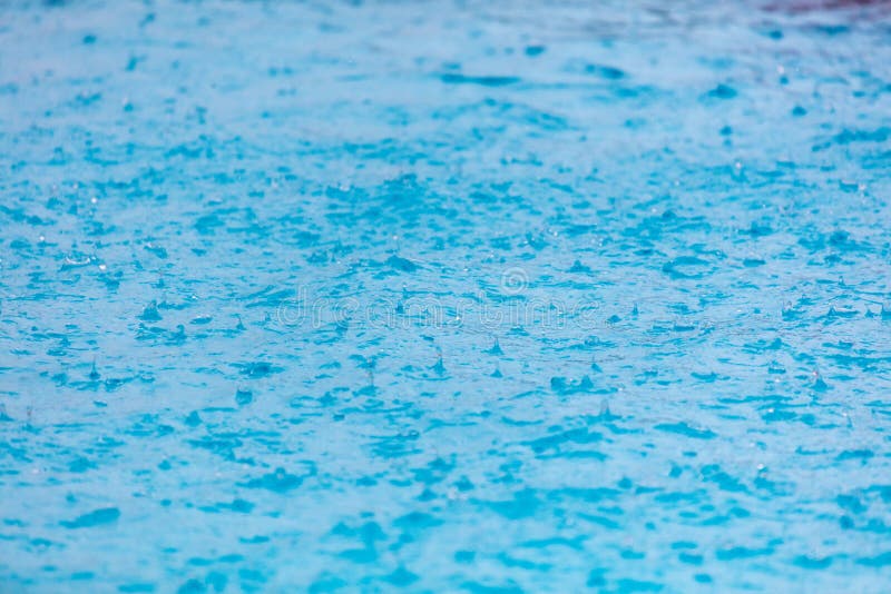 Surface of Blue Water in Heavy Rain. Stock Photo - Image of heavy, road ...