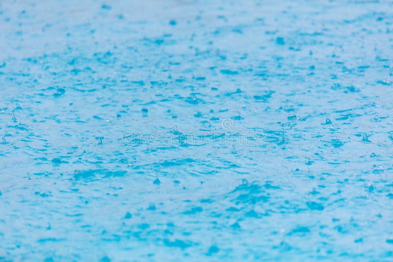 Surface of Blue Water in Heavy Rain. Stock Photo - Image of storm ...