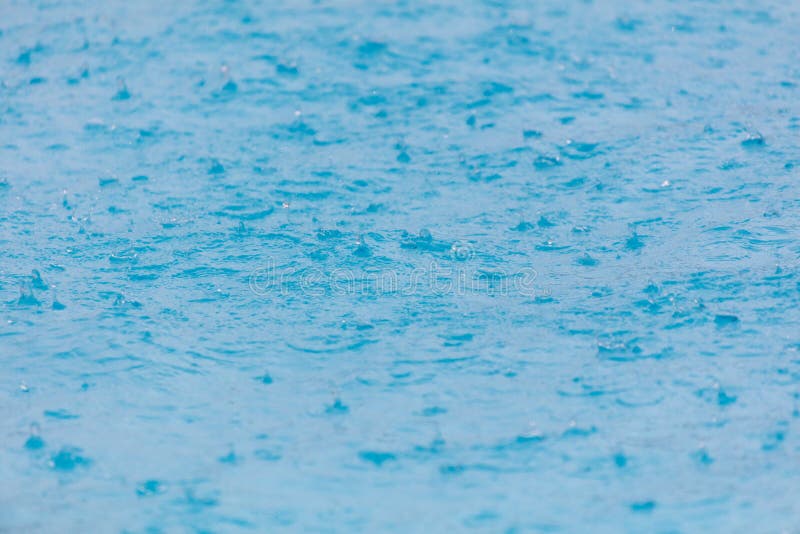 Surface of Blue Water in Heavy Rain. Stock Image - Image of abstract ...