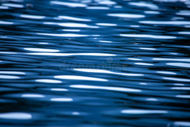 The Surface of the Blue Water Hits the Light. the River Hits the Light ...