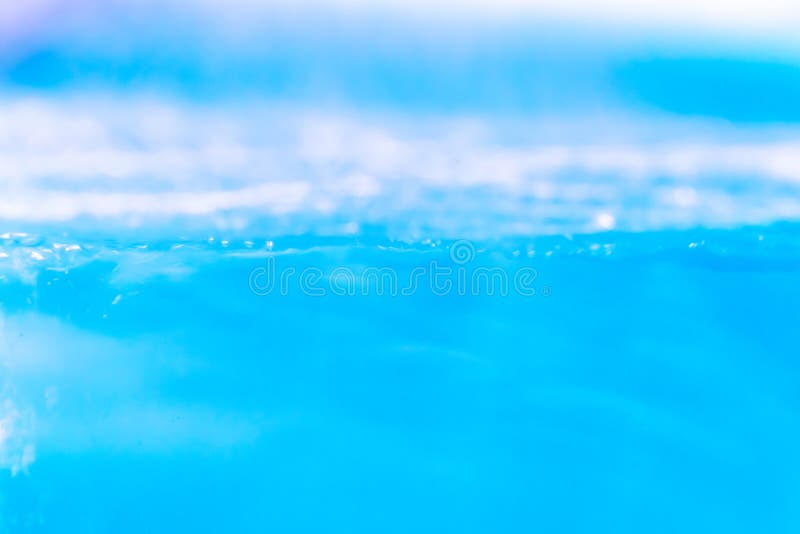 Surface of Blue Water Stream with Bubble and Hard Light Effected Stock ...