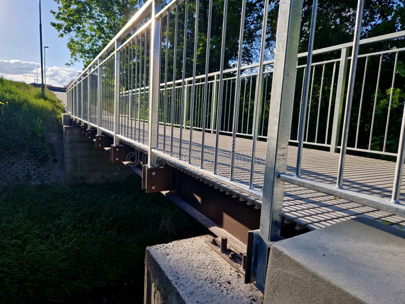 The Surface of the Bridge is Made of a Grid Made of Durable Plastic ...
