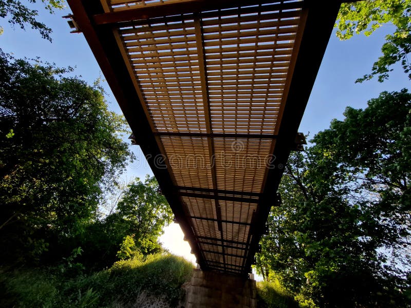 The Surface of the Bridge is Made of a Grid Made of Durable Plastic ...