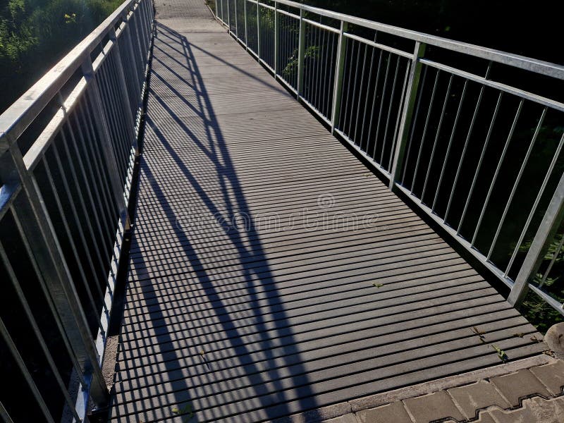 The Surface of the Bridge is Made of a Grid Made of Durable Plastic ...