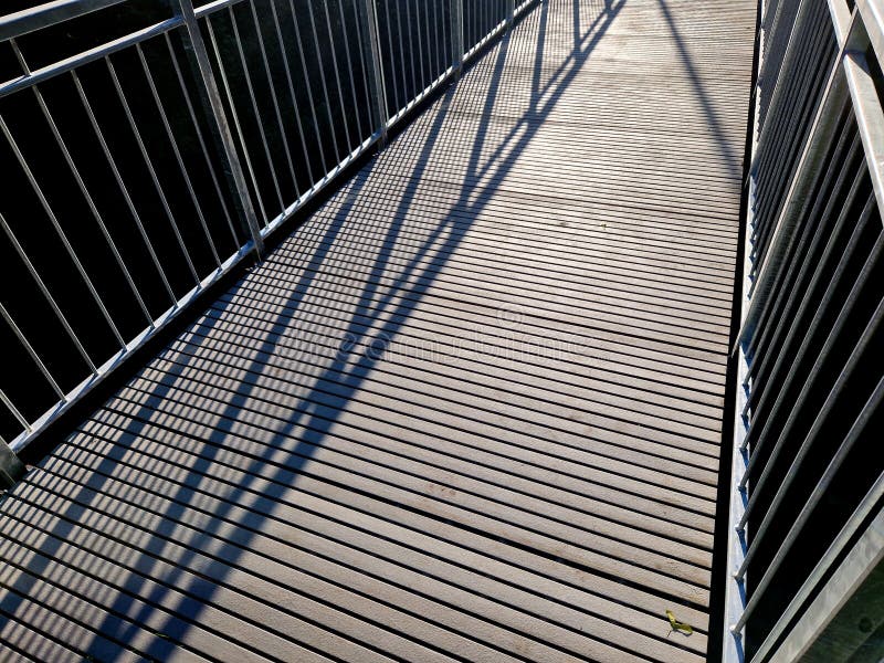 The Surface of the Bridge is Made of a Grid Made of Durable Plastic ...