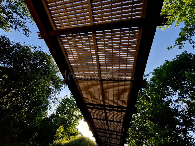 The Surface of the Bridge is Made of a Grid Made of Durable Plastic ...