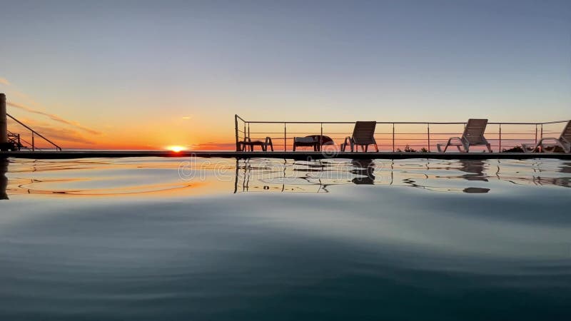 The Surface of the Calm Water of the Outdoor Pool Against the ...