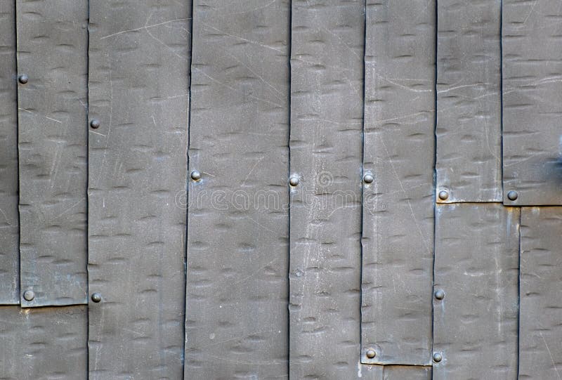 Surface Composed of Black Steel Plates, Connected by Rivets Stock Photo ...