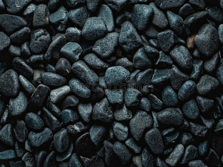 Captivating Abstract Background Featuring Dark Textured Pebbles in ...